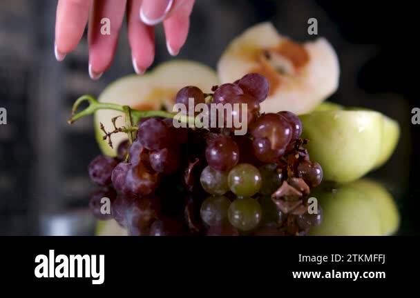 rotten spoiled fruits beautiful on top rotten inside grapes and apples ...