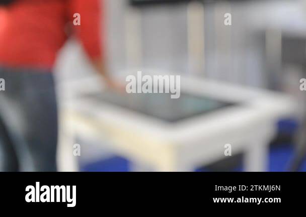 Blurred background. Woman sliding, flipping or scrolling through the ...