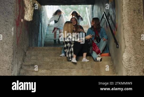 Happy reunion friends meeting hugging singing dancing showing emotions ...