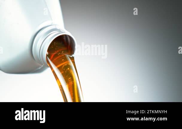 Super Slow Motion Shot of Pouring Oil from Plastic Container at 1000 ...