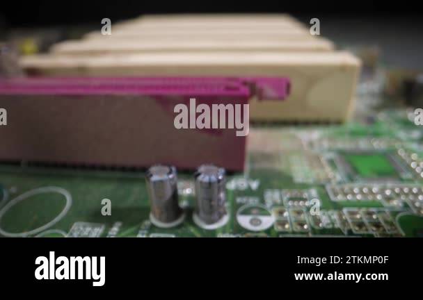 Old motherboard from a disassembled computer. Dolly shot Closeup. Old ...