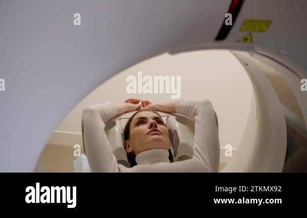 4k video girl patient is doing CT computed tomography x-ray scan of ...
