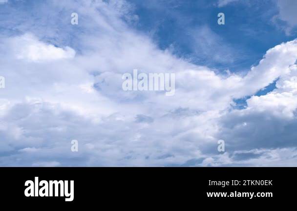 Blue sky white clouds. Puffy fluffy white clouds. Cumulus cloud cloudscape timelapse. Summer ...