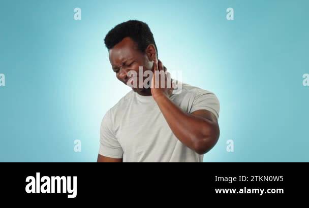 Neck pain, spine injury and black man with massage, sick with ...