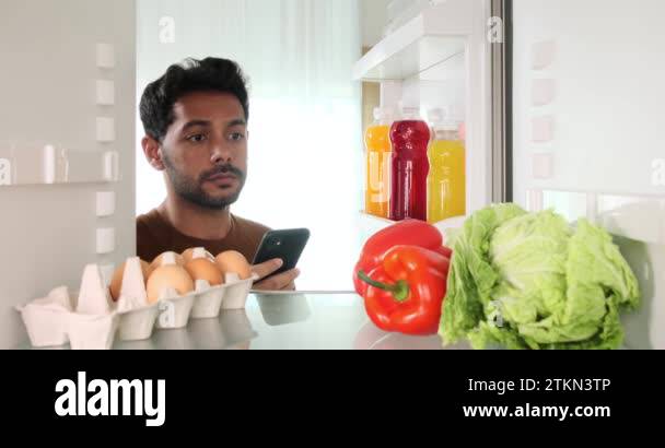 Office worker joyfully celebrates a significant success while seated at ...