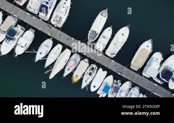 Sea bay with yachts and fishing boats. Top view Stock Video Footage - Alamy