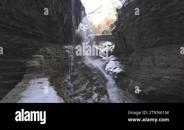 a cascade of waterfalls inside a cavern. rainbow falls at watkins glen ...