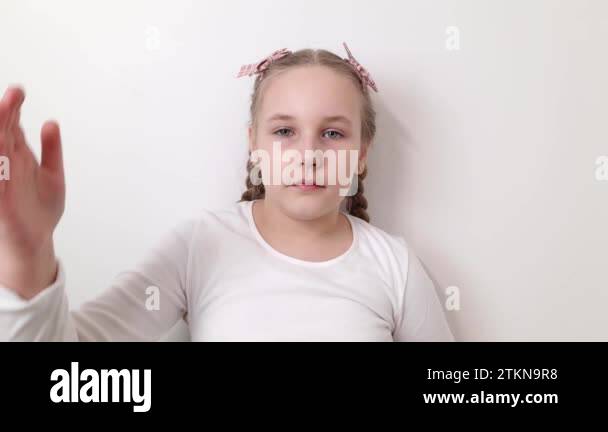 Little caucasian girl making facepalm gesture, feeling shame and regret ...