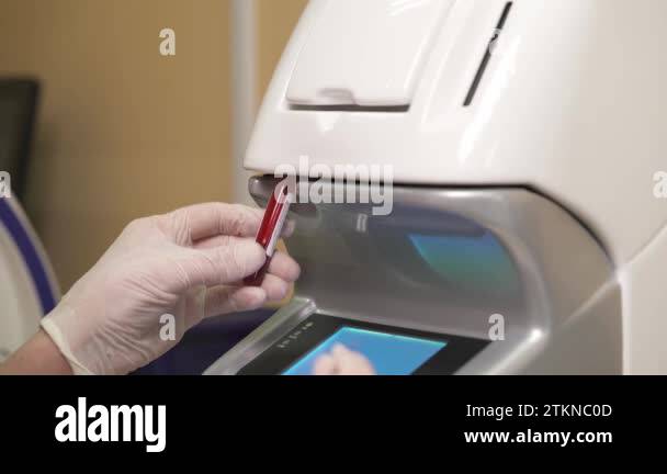 A close-up demonstration video of a clinical laboratory scientist ...