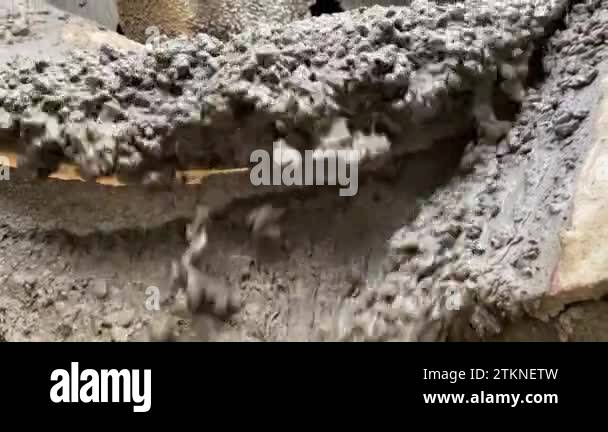 Pouring concrete mix on concreting form work. Forming, an essential ...