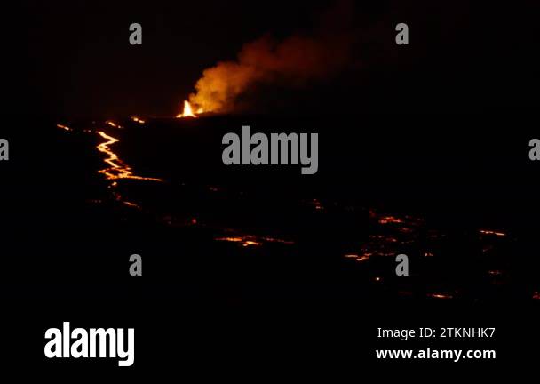 Epic view of lava fountain shooting up into air from Hawaii Mauna Loa ...