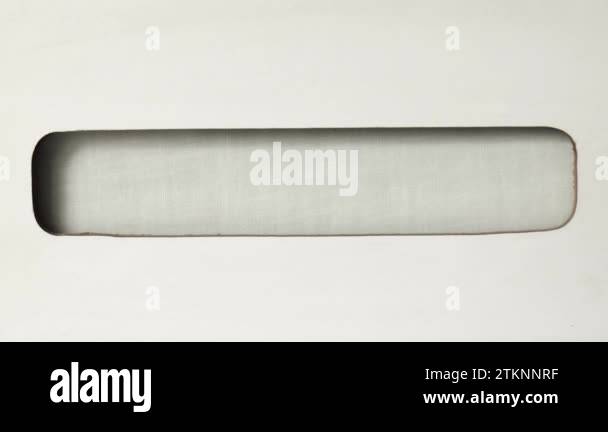 A retro office calendar is seen scrolling forwards from a blank setting ...