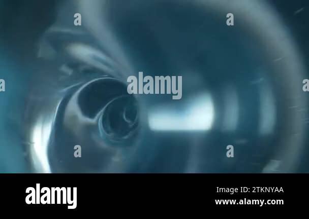 Top view of a spiral tunnel of a transparent liquid. Circular rotation ...