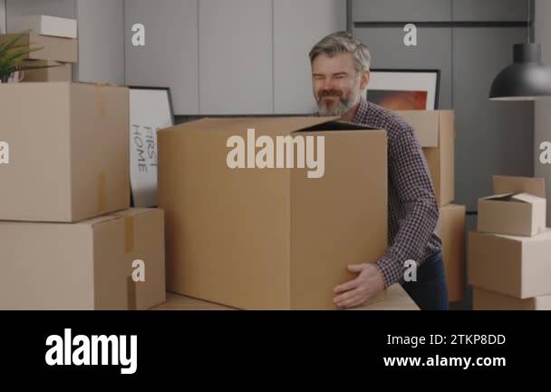 Man carrying heavy boxes moving Stock Videos & Footage - HD and 4K ...