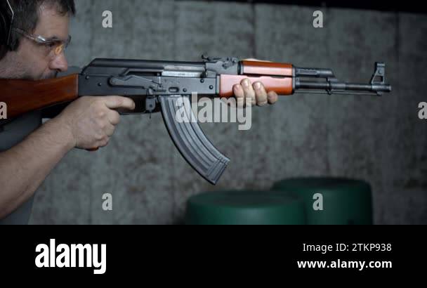 Firing ak 47 rifle Stock Videos & Footage - HD and 4K Video Clips - Alamy