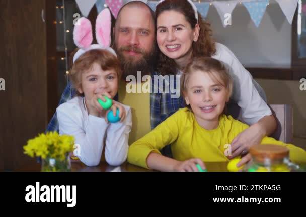 Easter Sunday Family traditions. Parents mom and dad two caucasian ...