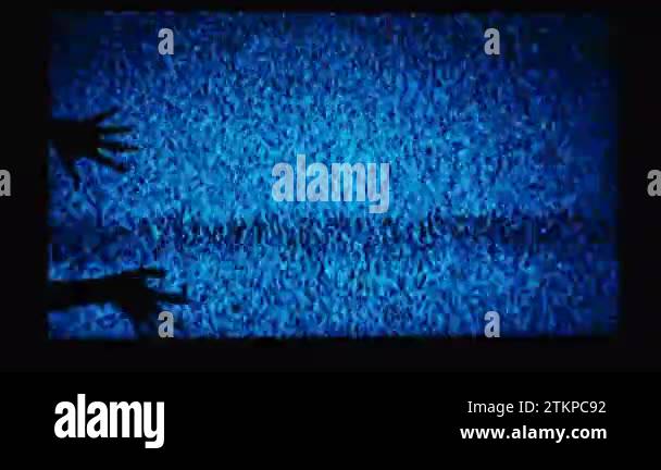 Hands on the background of the noise of the TV scary scene for a horror ...