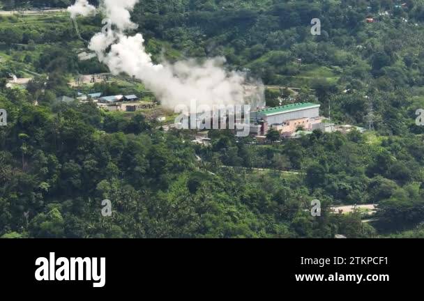 Geotermal power plant in the mountains. Geothermal station with steam ...