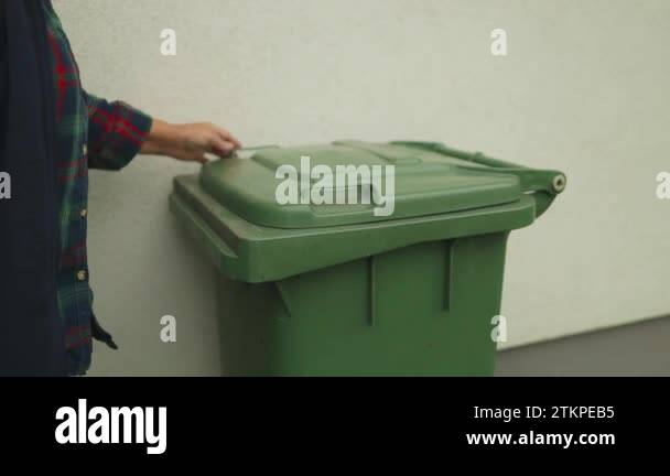 Saving the environment, charity and people putting trash in garbage ...