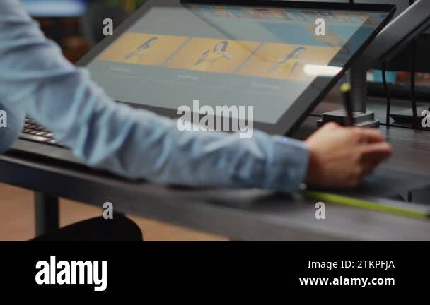 Asian professional artist editing pictures with graphic tablet and ...