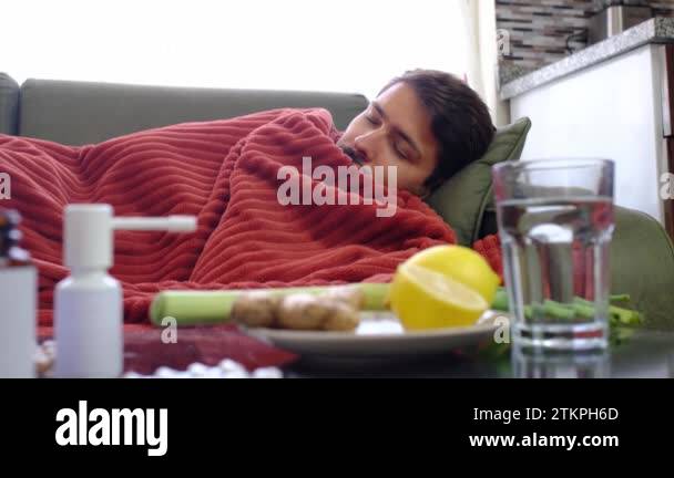 Ginger, lemon, onion and different drugs on table on background sick ...