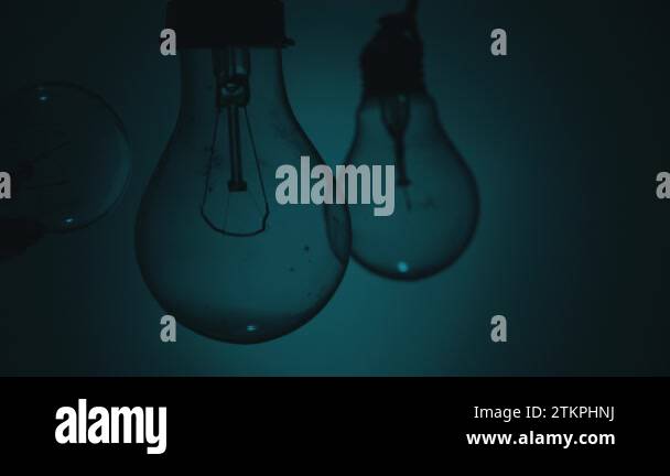 Light bulb turns on and goes out at the touch of a persons hand in the ...