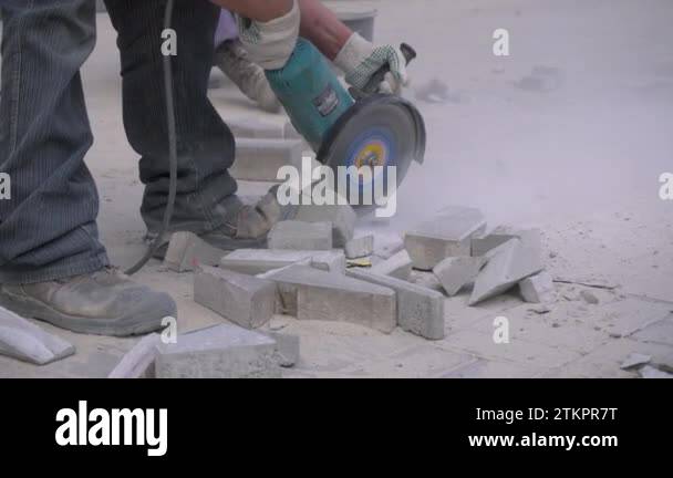Worker Saws Saw Paving Slabs, Circular Saw, Work Gloves and Stick Foot ...