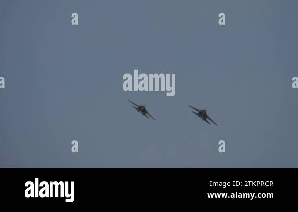 Two military fighter planes in the sky. Jets at an airshow. Military ...