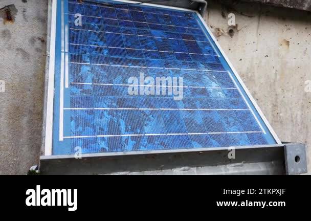 Portable solar battery. The surface of the battery is blue. Ecological ...
