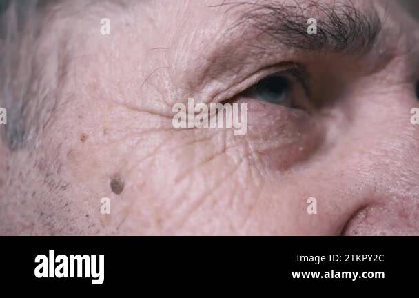 Close up, Deep Wrinkles, Thick Eyebrows, Eyes, an Old Man Looking into ...