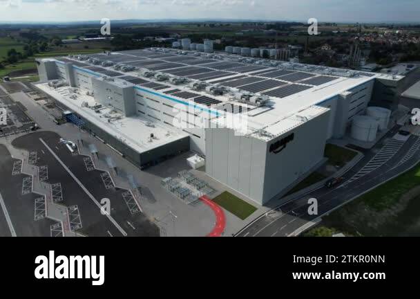 modern distribution logistic center aerial drone view of industrial ...