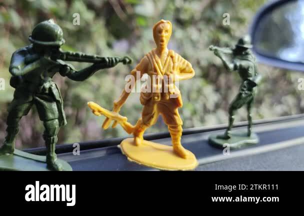 toy soldiers. war. soldier with weapons. injury and death in war ...