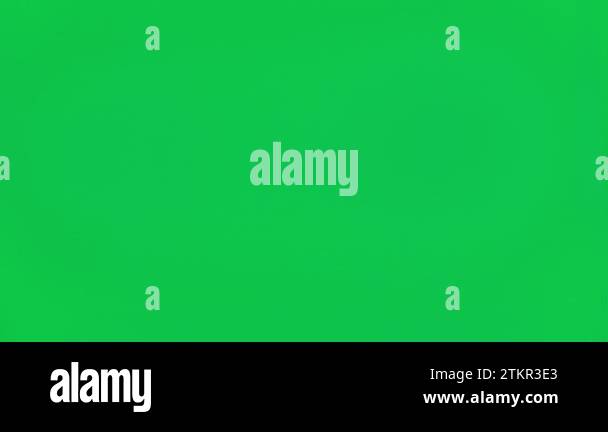 Mans hand shows gestures and signs of success on a chroma key green ...