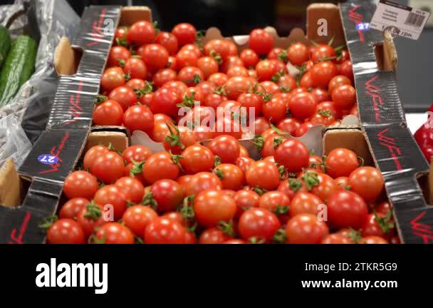 Chia seeds close-up in a black open container on a store counter. Dry ...