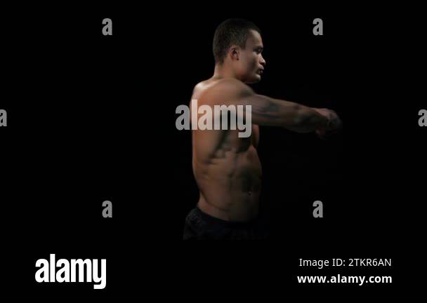 Strong muscular athletic man twisting of the torso. Muscular man ...
