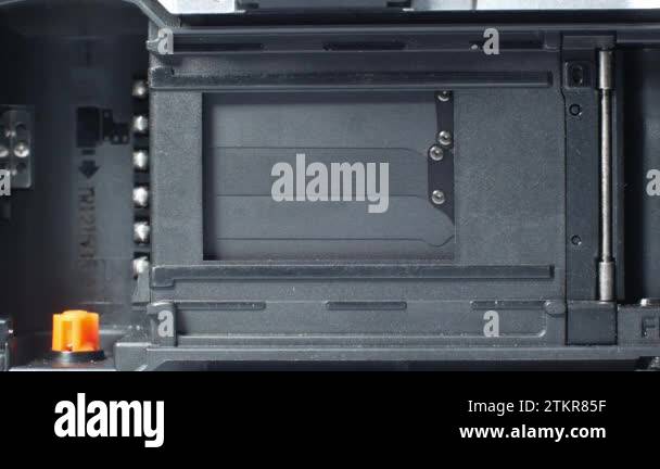 Actuation of the shutter mechanism of an old film camera inside the ...
