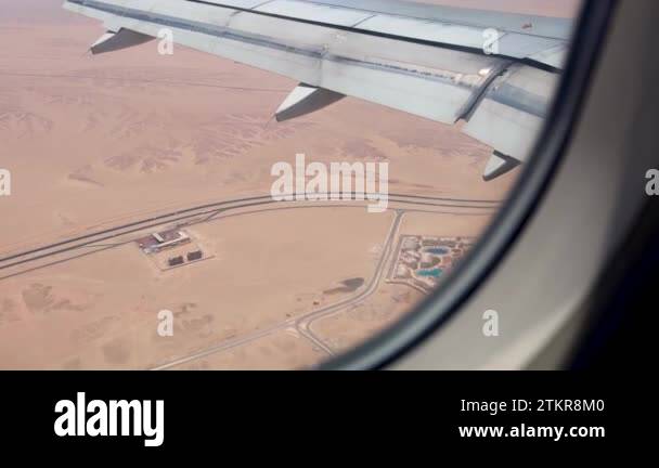 Scenic aerial perspective: Desert hotels and pools seen through an ...