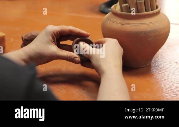 Skilled potter. Crafting handiwork. Shaped sculpture. Artistic finger ...