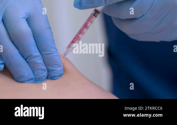 Doctor administering intramuscular injection Stock Videos & Footage ...