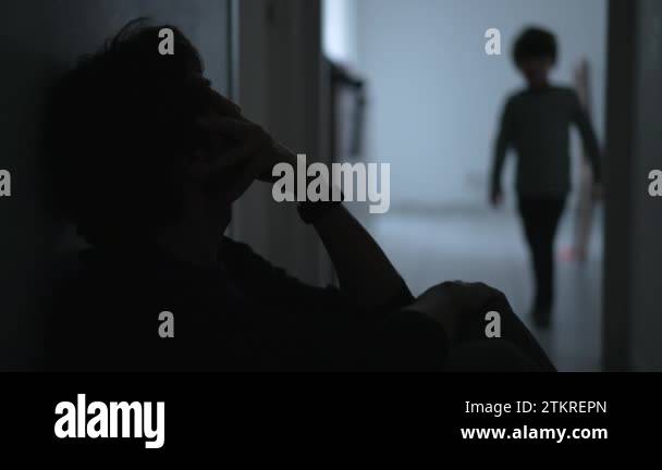 Son hugging father during crisis. Child consoling dad in difficult ...