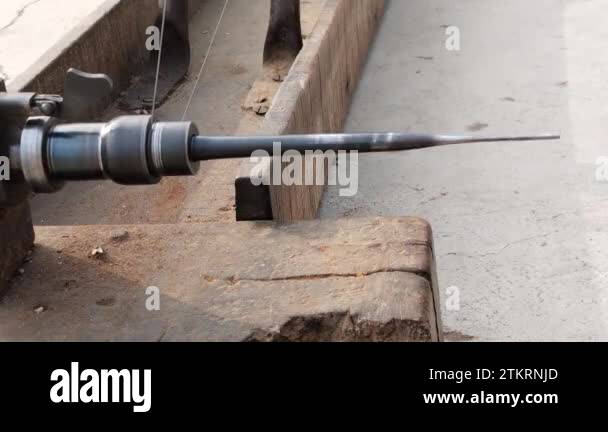 charkha or spinning wheel for rolling thread in spool and spindle, and ...