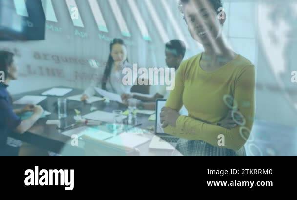 Animation of graphs, globe and computer language, biracial woman standing arms crossed in office ...