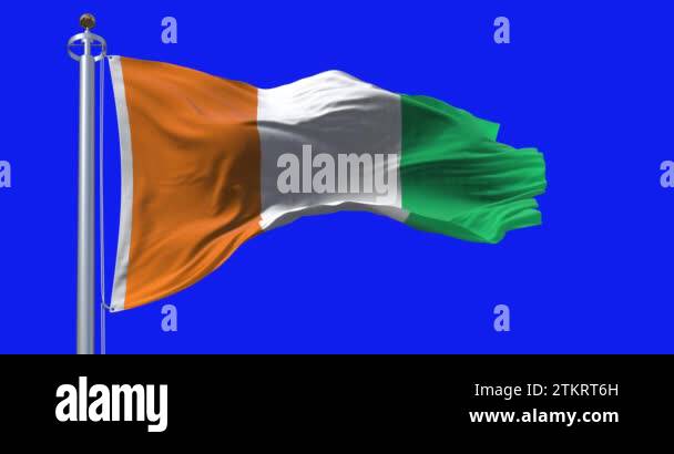 Ivory Coast national flag waving in the wind on blue background. Three ...