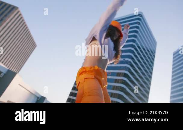 Hip-hop queen making twerk. Breakdancer woman enjoying sunset 4K ...