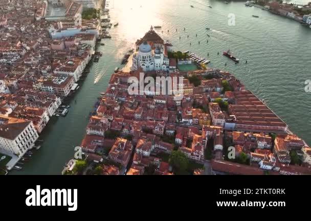 Venice from the sky, showcasing Basilica, Grand Canal, Punta della ...