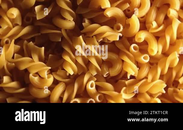Uncooked Fusilli and Chifferi Rigati Pasta - Top View, Close-Up, Low ...