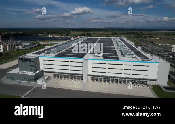 modern distribution logistic center aerial drone view of industrial ...
