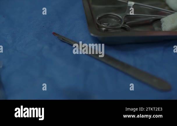 Surgical dental instruments on the table during an operation to remove ...