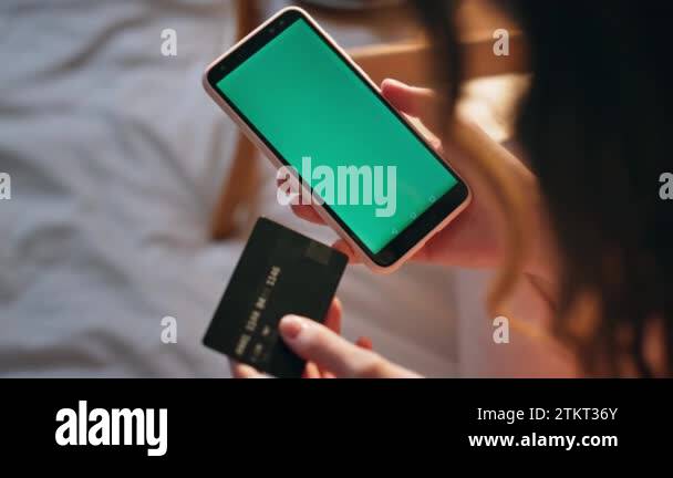 Hands hold chromakey smartphone at home closeup. Girl customer use ...