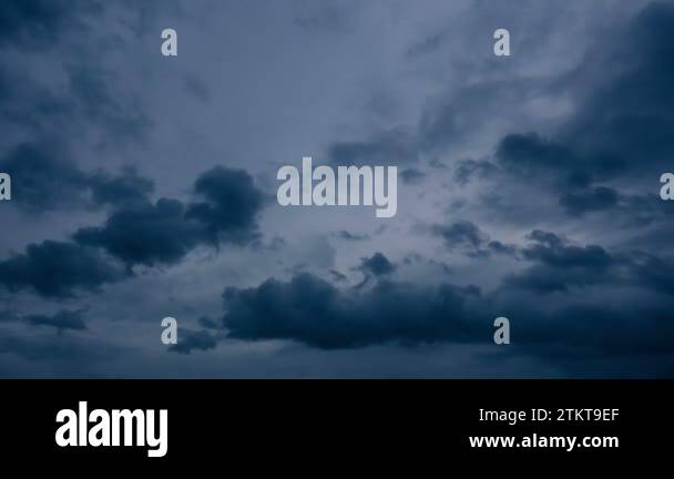 Clouds moving and rolling on twilight to dark sky background. 4k time ...